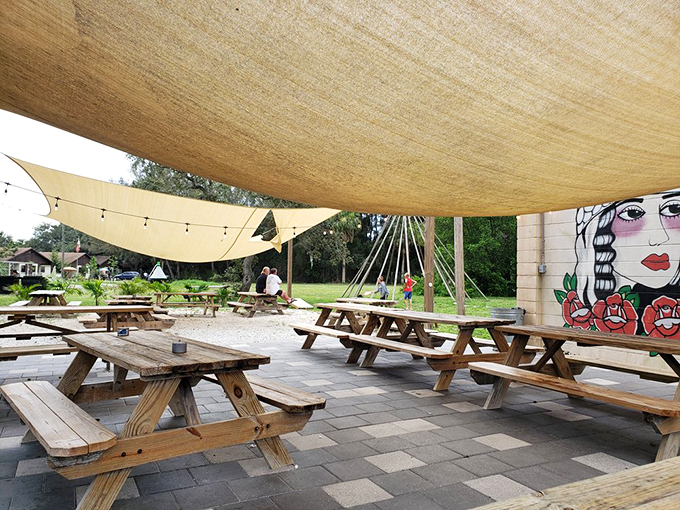 As evening falls, the outdoor seating area transforms into a twinkling seafood oasis&mdash;proof that plastic chairs and picnic tables can still create magic.