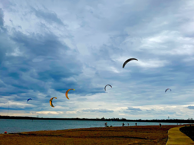 Colorful parasails dot the sky like exclamation points in nature's sentence: "Yes! This is actually in Ohio! Not a screensaver!"