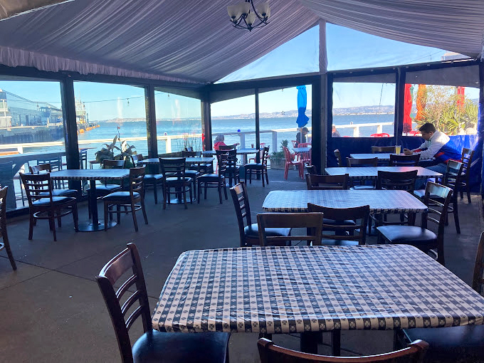 The covered patio ensures your seafood feast continues uninterrupted, whether Karl the Fog decides to make a cameo or not.