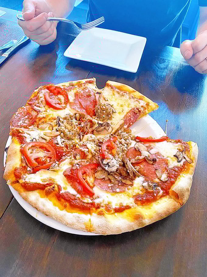 Pizza that achieves that perfect balance between artisanal craftsmanship and "I want to devour this immediately" appeal.