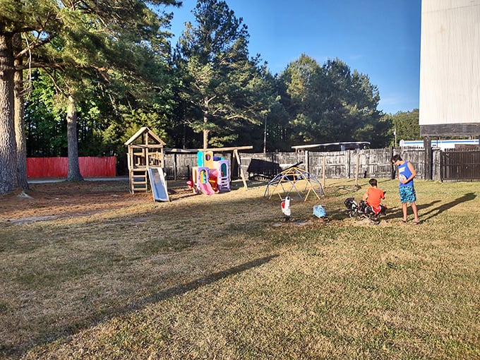 Kids burn off energy before showtime at the playground&mdash;the original pause button for family movie nights.