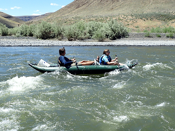 White-water warriors navigate the John Day's currents, demonstrating that inflatable kayaks are the desert equivalent of convertibles&mdash;thrilling and slightly impractical. 