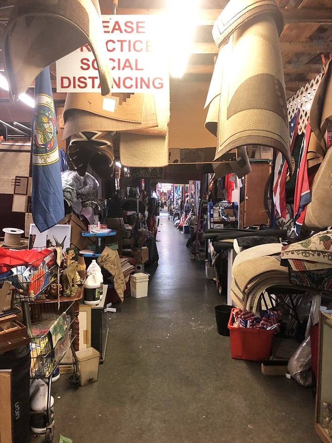 Social distancing signs remind us of recent times, but the narrow passages packed with merchandise create a treasure hunter's paradise worth navigating.