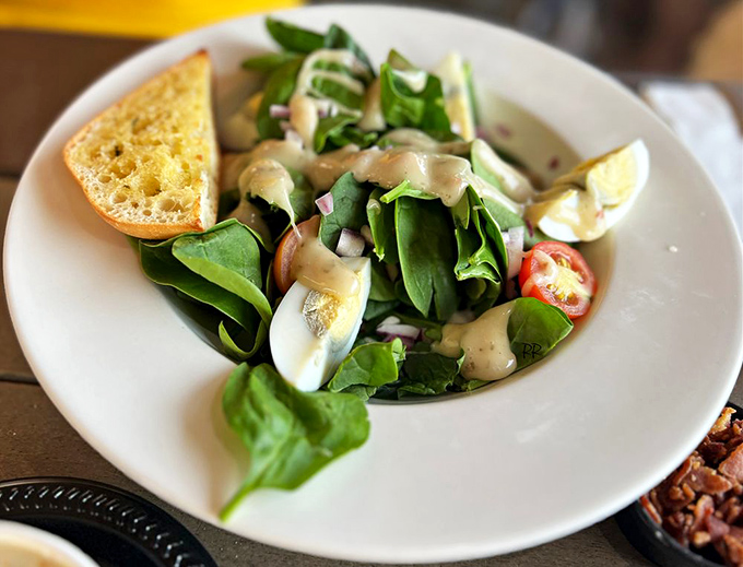 Even the salad gets the coastal treatment here&mdash;fresh greens playing supporting role to the real stars of the Chesapeake. A palate cleanser between crab courses.