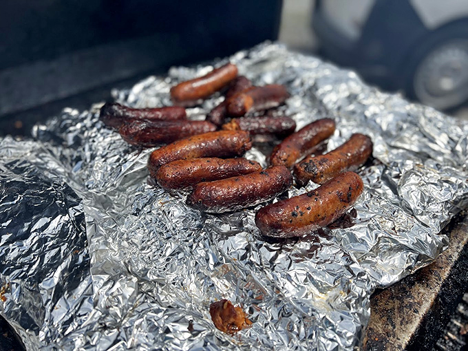 Sausages having a smoke break of their own. These links have the kind of snap that makes meat lovers go quiet for a moment of respectful appreciation.