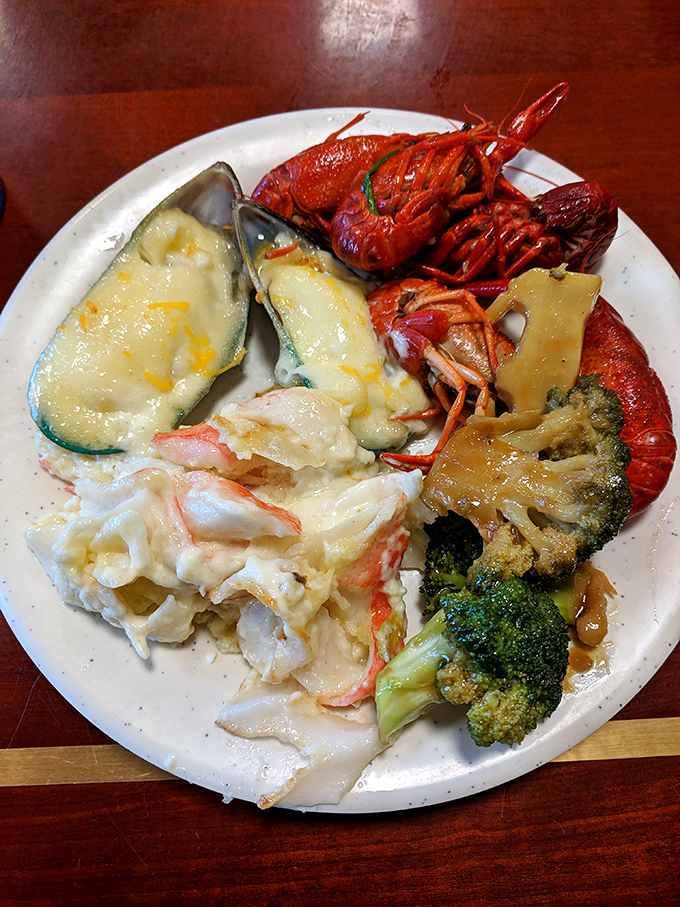 Crystal chandeliers watch over islands of culinary treasures. This isn't just a buffet &ndash; it's a food palace worthy of its royal name. 