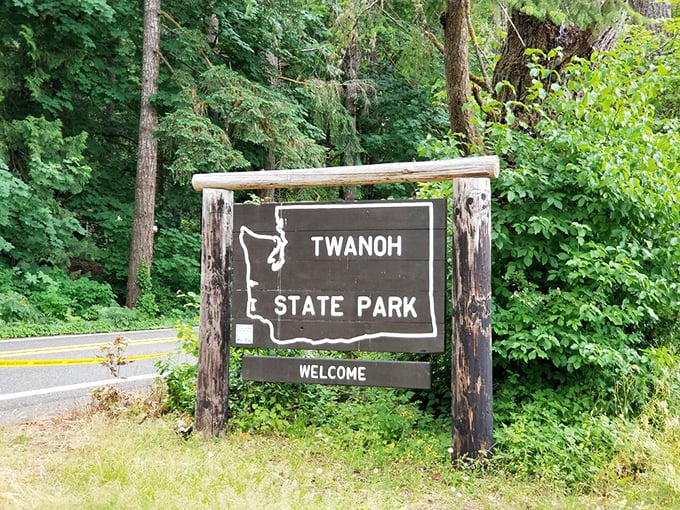 The humble welcome sign that promises adventure. Like finding the entrance to Narnia, but with better parking and fewer talking animals.