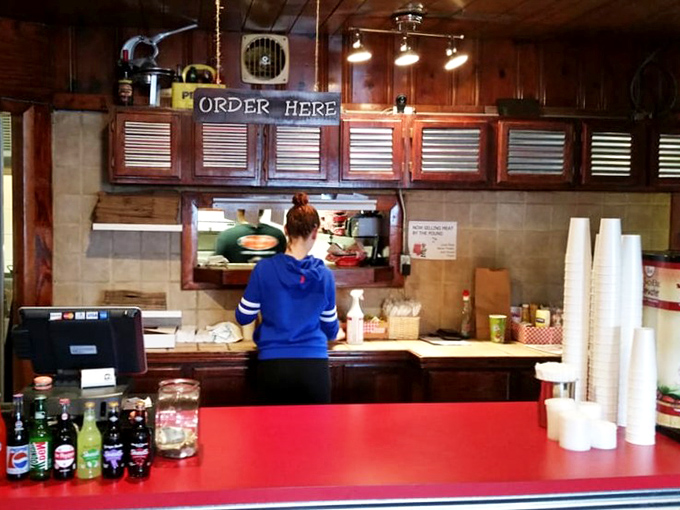 Where the magic happens. The "Order Here" sign might as well say "Happiness Distribution Center" for hungry patrons.