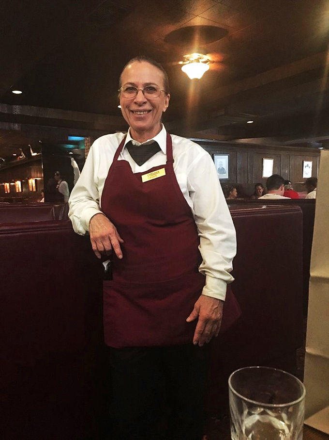 The staff doesn't just serve food; they're custodians of tradition, carrying decades of hospitality wisdom in every efficient movement.