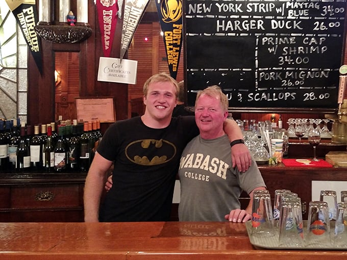 Enjoy the friendly service and local vibes as you grab a drink at the bar under the iconic daily specials.