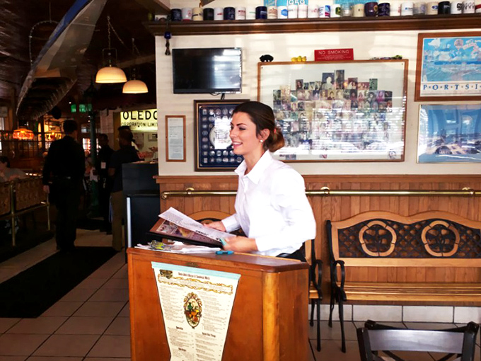 The host stand—first checkpoint on your journey to breakfast nirvana, where menus are distributed and morning dreams begin to take shape.