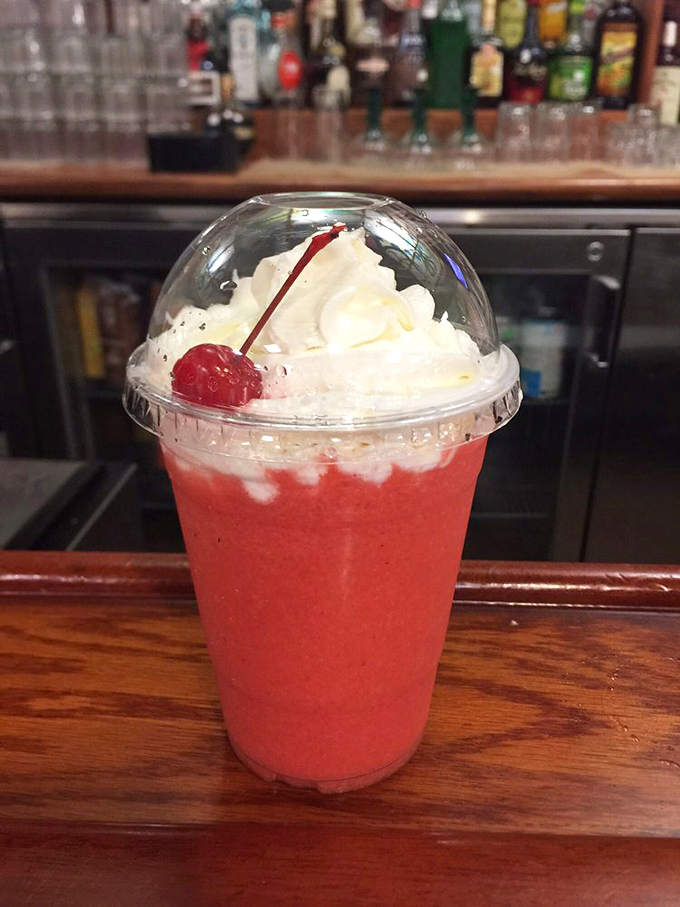 A frozen strawberry concoction topped with whipped cream and a cherry&mdash;because after four plates, you deserve a little liquid dessert.