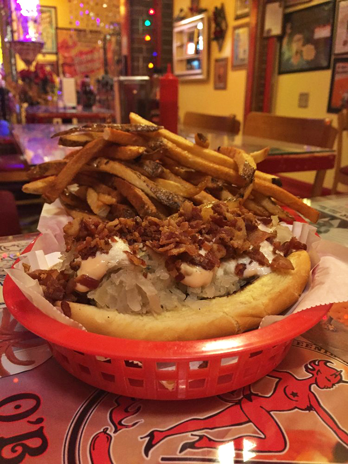 The Varla arrives with a side of golden fries. This is what comfort food looks like when it dresses up for a night on the town.