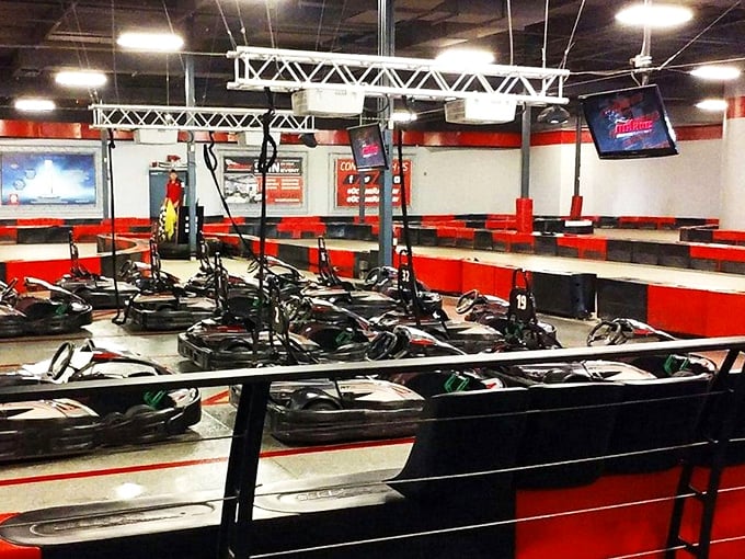 From this vantage point, you can scout the competition or simply appreciate the ballet of amateur drivers attempting professional maneuvers.