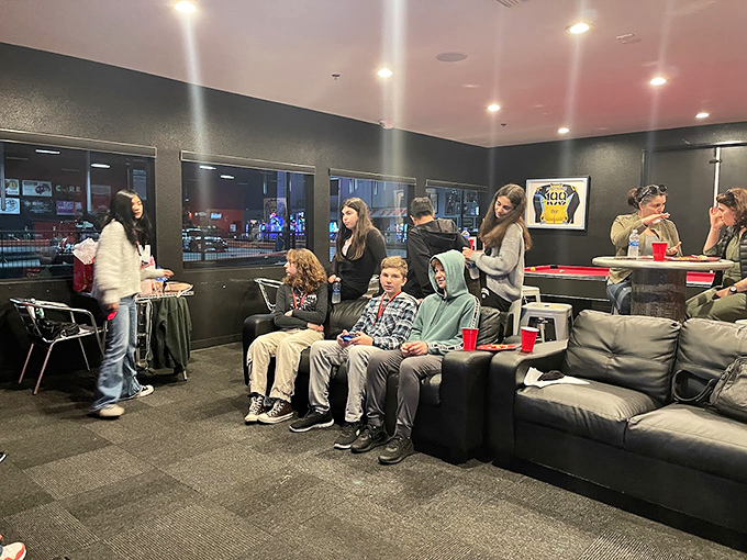 The lounge area: where racing strategies are debated, excuses are crafted, and rematches are inevitably scheduled.