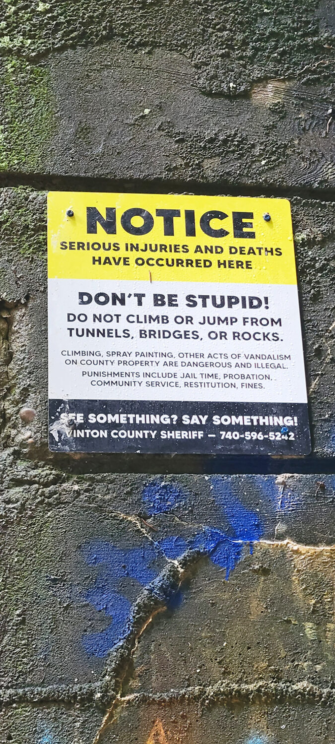 Nothing says "fun family outing" quite like warnings of serious injury and death. This cheerful sign adds that special touch of authentic danger to your ghost-hunting expedition.