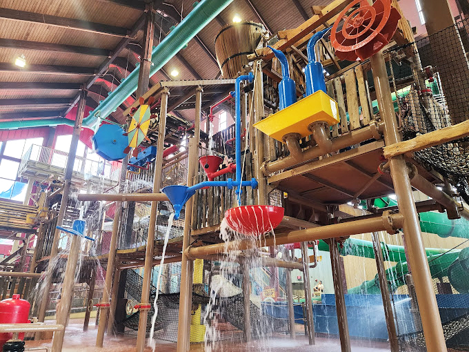 This multi-level water playground is where kids perfect the art of strategic water battles while parents appreciate the genius of contained chaos.
