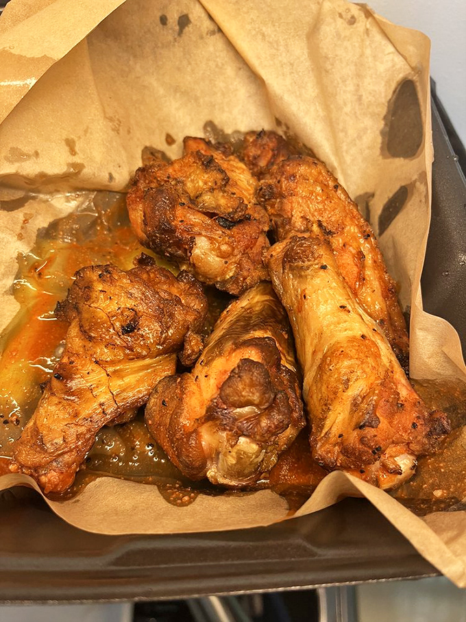 These wings aren't just cooked&mdash;they're transformed. Swimming in their own glorious juices, they're the reason napkins were invented.