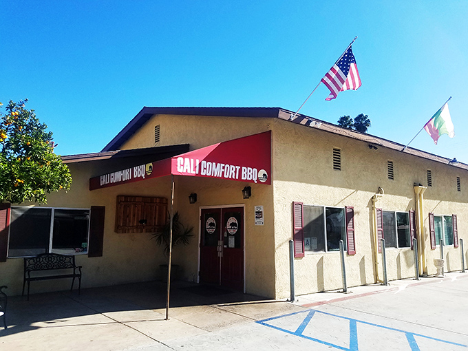 Cali BBQ: Simple yellow building, serious barbecue credentials. San Diego County's hidden gem for smoke enthusiasts.