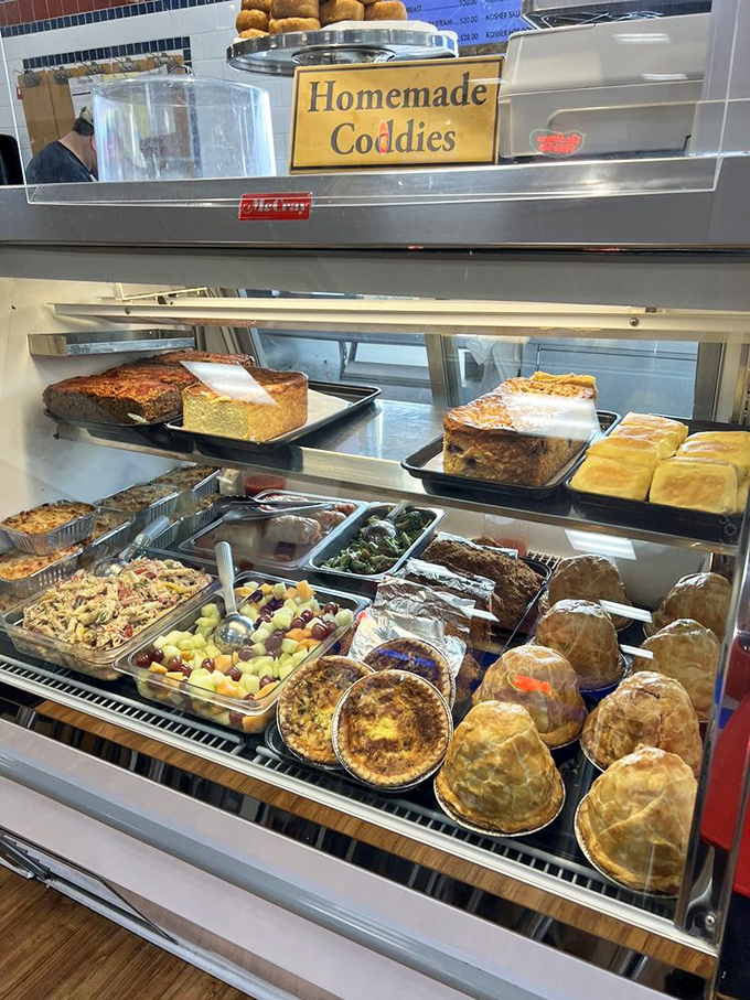 The display case&mdash;a treasure chest of homemade delights where knishes and kugel await their moment of glory.
