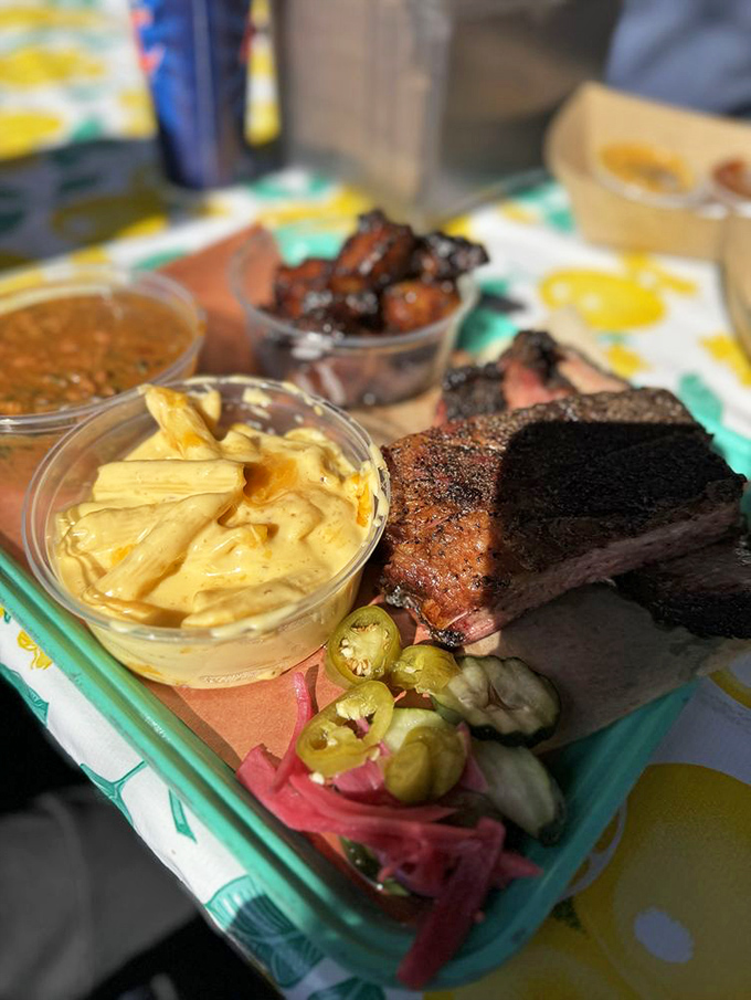 A barbecue spread that would make a vegetarian question their life choices. The mac and cheese alone deserves its own fan club.