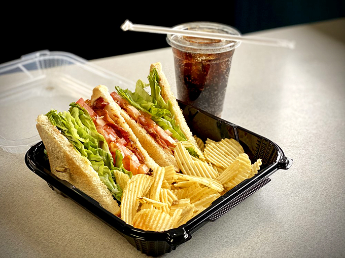 A BLT that's architectural in its construction, with layers of crisp bacon, fresh lettuce, and tomato between perfectly toasted bread.