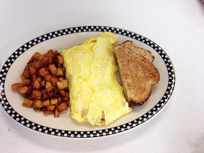 The omelet that makes you question why you ever settled for cereal&mdash;a golden envelope delivering cheese, vegetables, and morning happiness.