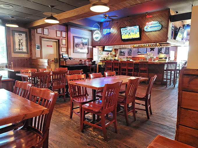The bar area balances rustic charm with modern comfort. Where stories are shared and friendships are forged over perfectly grilled proteins.