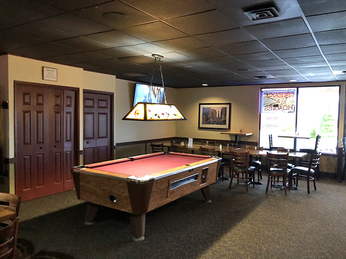 The pool table area – where you can rack 'em up after filling up, though your cheesesteak food coma might affect your aim.