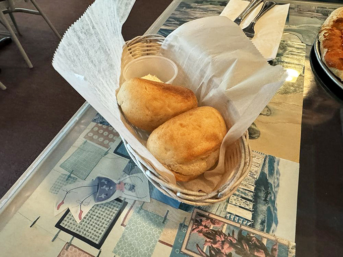 Fresh-baked bread rolls arrive like warm, pillowy clouds&mdash;the kind of bread that makes you reconsider your entire relationship with carbohydrates.
