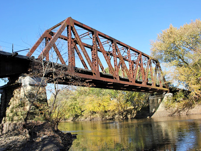This historic bridge spanning the Big Blue River has witnessed generations of Beatrice residents crossing between youth and wisdom, much like retirement itself. 