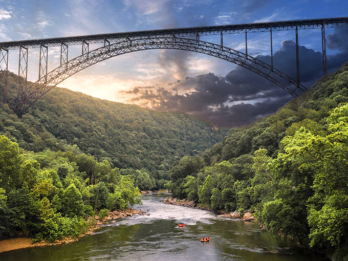 The New River Gorge Bridge arcs across the valley like a steel rainbow, connecting not just two sides but past and present in magnificent engineering.