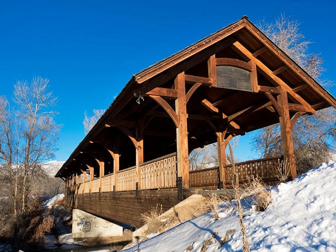 This covered bridge doesn't just connect two riverbanks—it links Midway's storybook charm with practical, everyday mountain living.