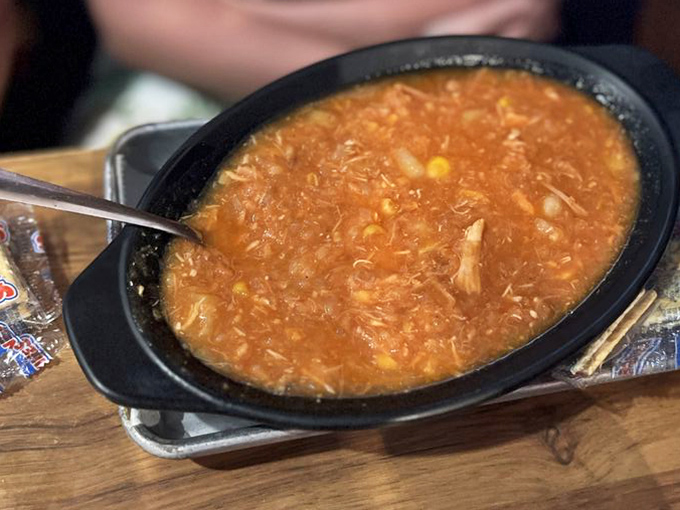 Brunswick stew: the South's answer to comfort in a bowl. Chunks of that famous barbecue swimming in tomato broth&mdash;like a meat jacuzzi.
