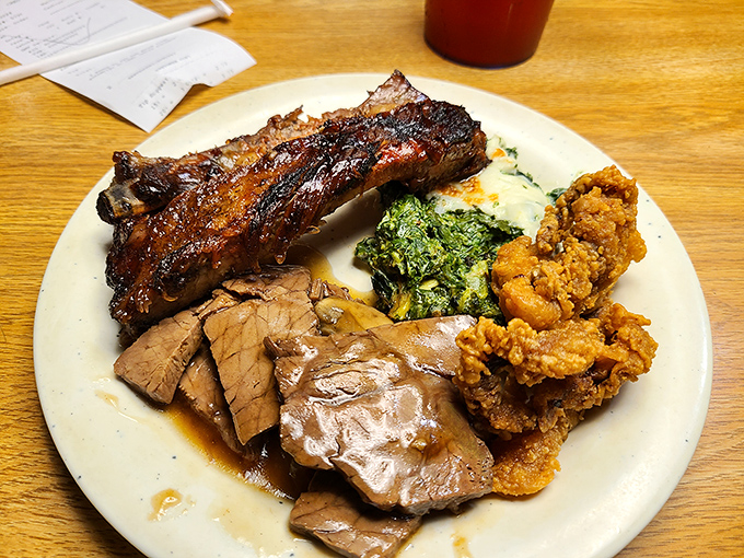 A plate that tells the story of indecision in the most delicious way. When asked "ribs or fried chicken?" the correct answer is "yes."