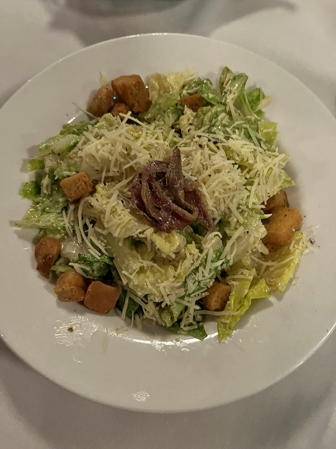 A Caesar salad that respects the classics &ndash; crisp romaine, savory croutons, parmesan, and a dressing that knows its job is to enhance, not overwhelm.