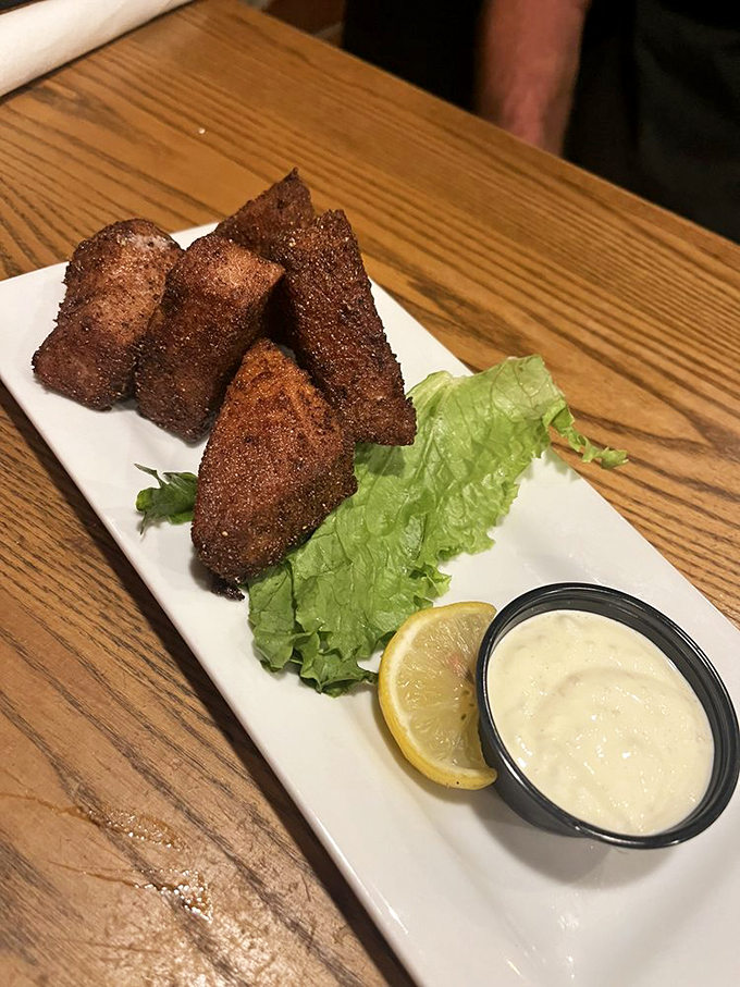 Golden-brown triangles of joy that prove fried food is one of humanity's greatest achievements. The dipping sauce is just a bonus.