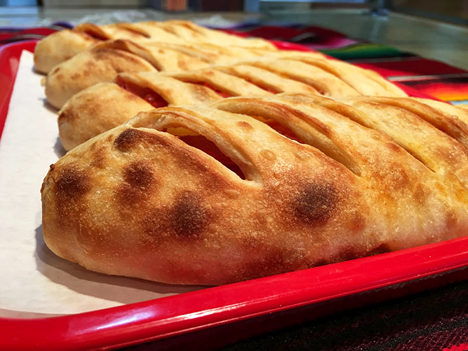 Golden-brown empanadas that crackle with promise when you break into them. The perfect portable pocket of flavor.