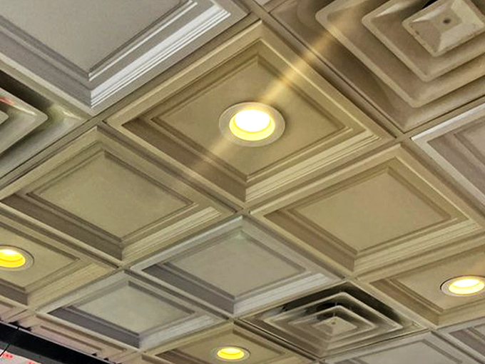 Even the ceiling gets special attention at Legends &ndash; those geometric panels watching over countless moments of first-bite bliss and clean-plate triumphs.