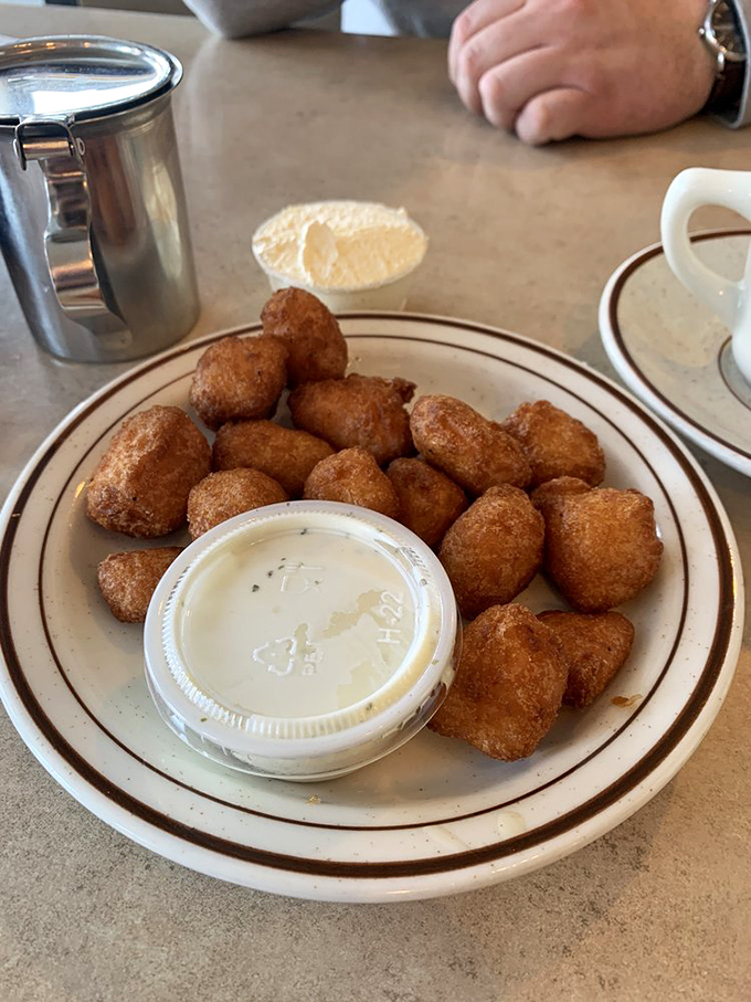 These aren't just cheese curds&mdash;they're Wisconsin's contribution to happiness, fried to golden perfection and waiting to squeak their approval.