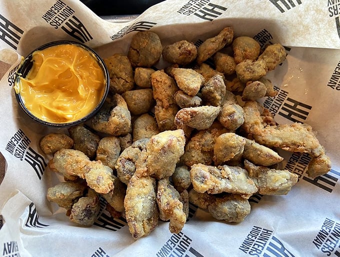 These aren't just chicken gizzards&mdash;they're crispy little flavor bombs with a side of liquid gold. Offal has never looked so temptingly, deliciously awful-good.