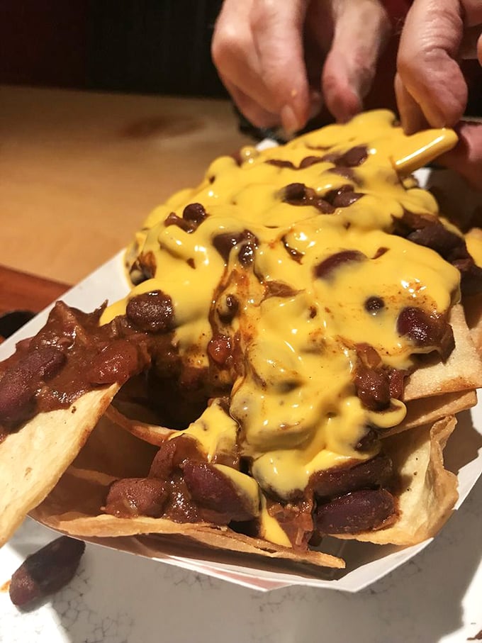 Nachos that don't understand the concept of restraint. Every chip supports a small mountain of toppings in this magnificent exercise in excess.