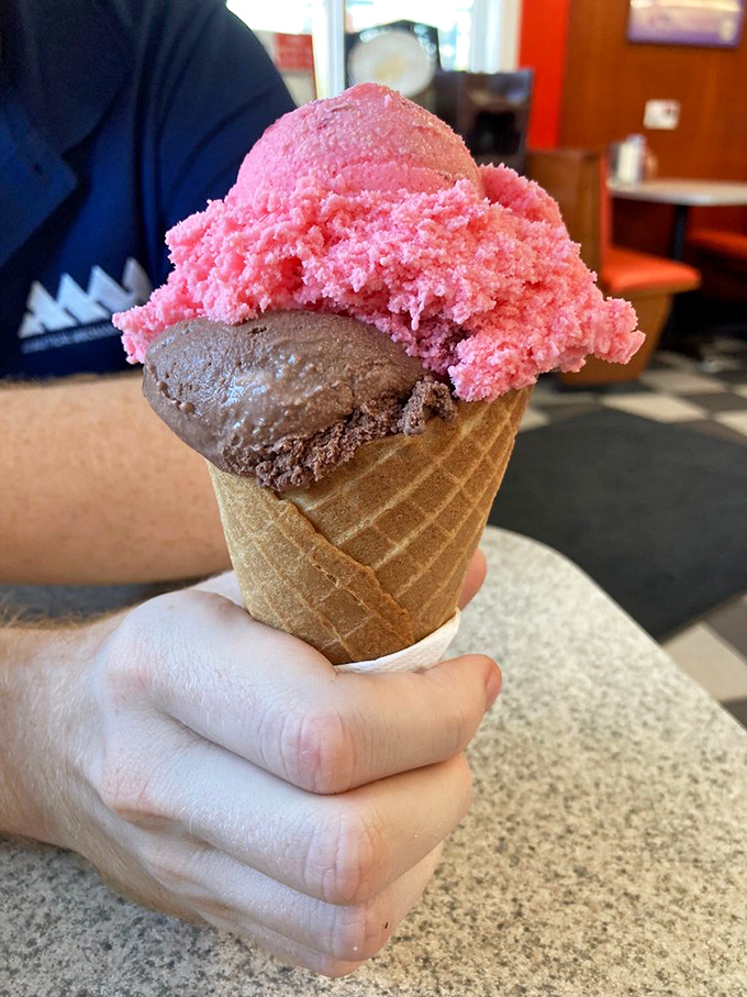 Ice cream nirvana in a handmade waffle cone&mdash;chocolate brooding below while strawberry brings the party on top, a perfect temperature tango.