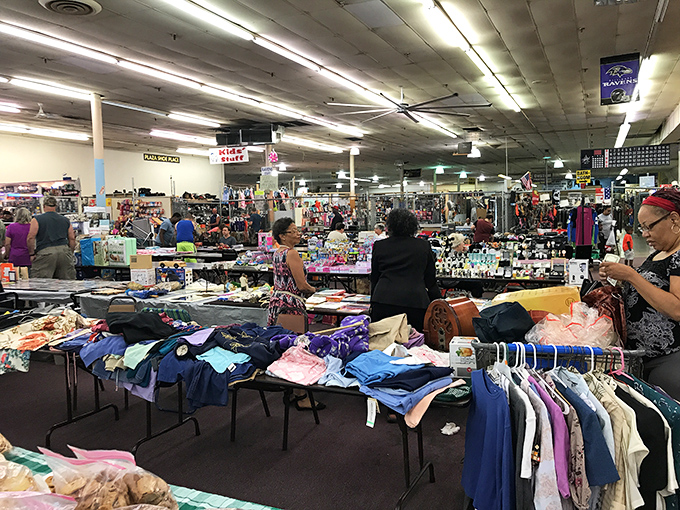 The clothing section stretches to the horizon, a textile sea where patient shoppers can fish for designer labels hiding among the everyday brands.