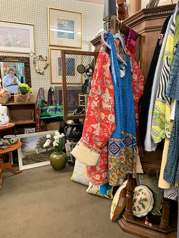 Vintage textiles hanging like colorful ghosts of fashion past&mdash;each pattern telling stories of decades when style had personality.