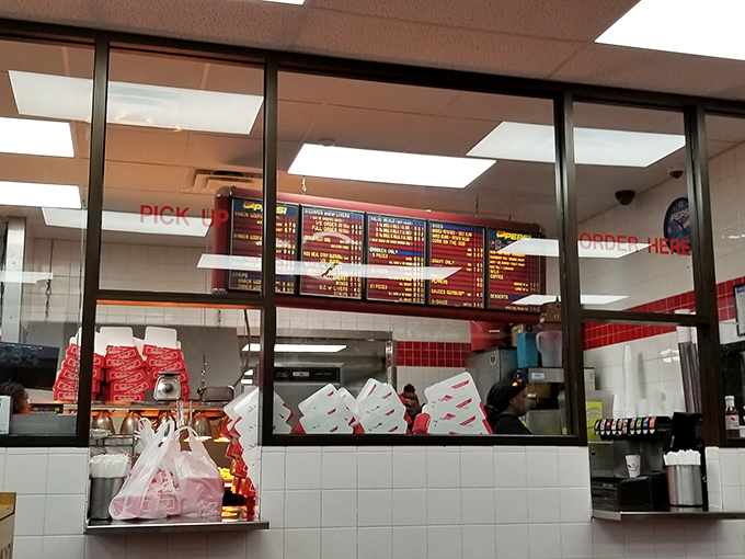 The ordering counter&mdash;that magical threshold where chicken dreams become delicious reality. Choose wisely, though all paths lead to happiness. 