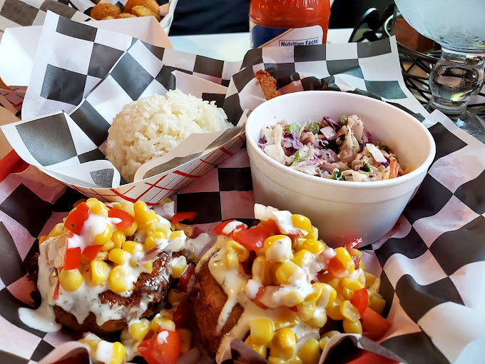 The crab cakes, rice, and coleslaw create a holy trinity of flavors that might make you consider moving to Liberty permanently.