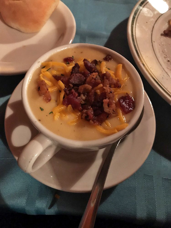This isn't just potato soup – it's a warm, creamy hug in a mug topped with bacon and cheese because comfort food should never be subtle.