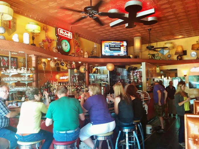 When the lunch crowd gathers at the circular bar, it's like a United Nations summit where the only resolution is to order another round.