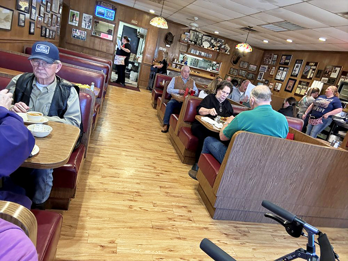 The dining room hums with the comfortable rhythm of regulars and road-trippers, all united by the universal language of good food.